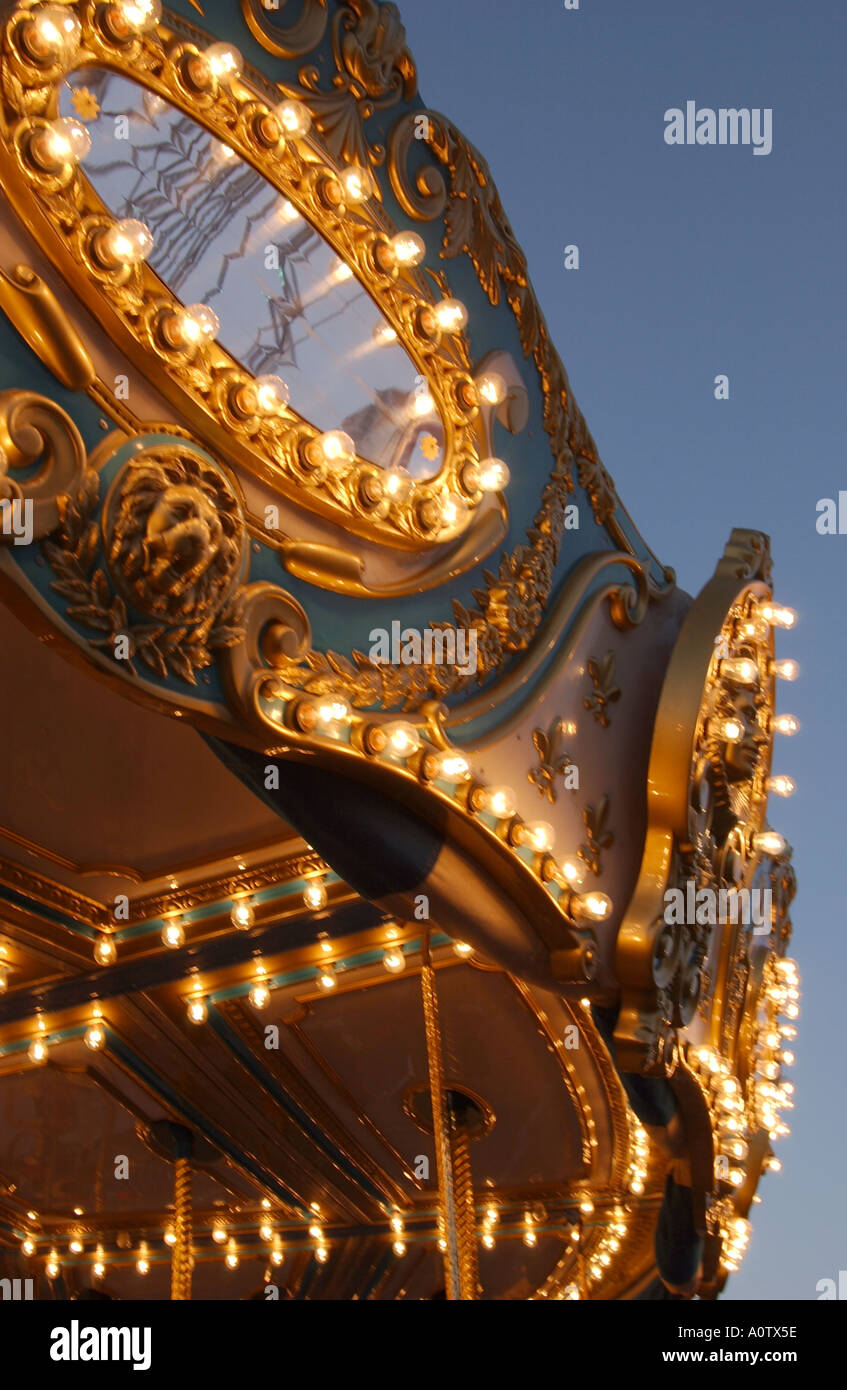 Lights and mirrors on carousel at dusk New Mexico State Fair ...