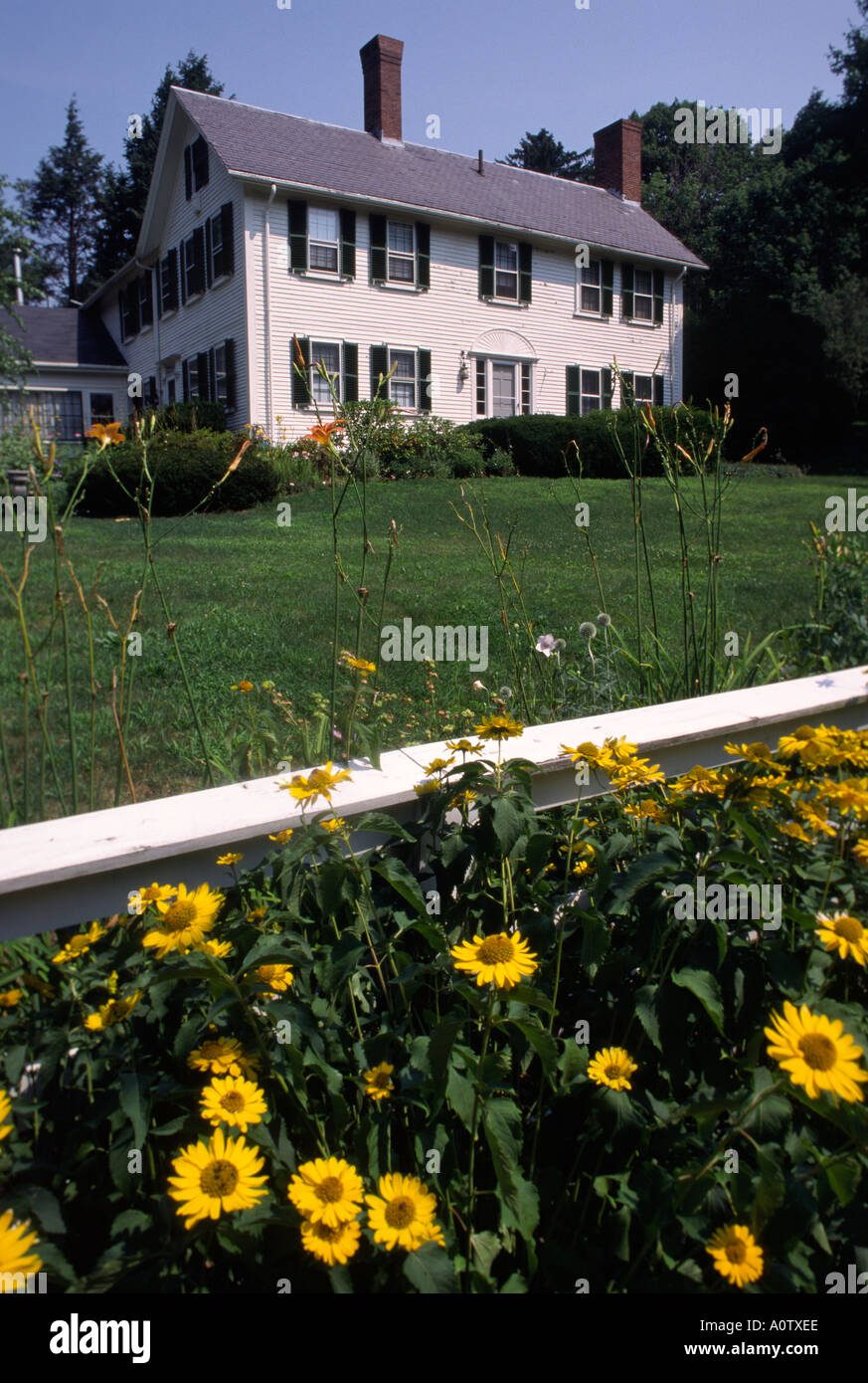 Colonial restoraton suburban house wood rail fence Stock Photo - Alamy