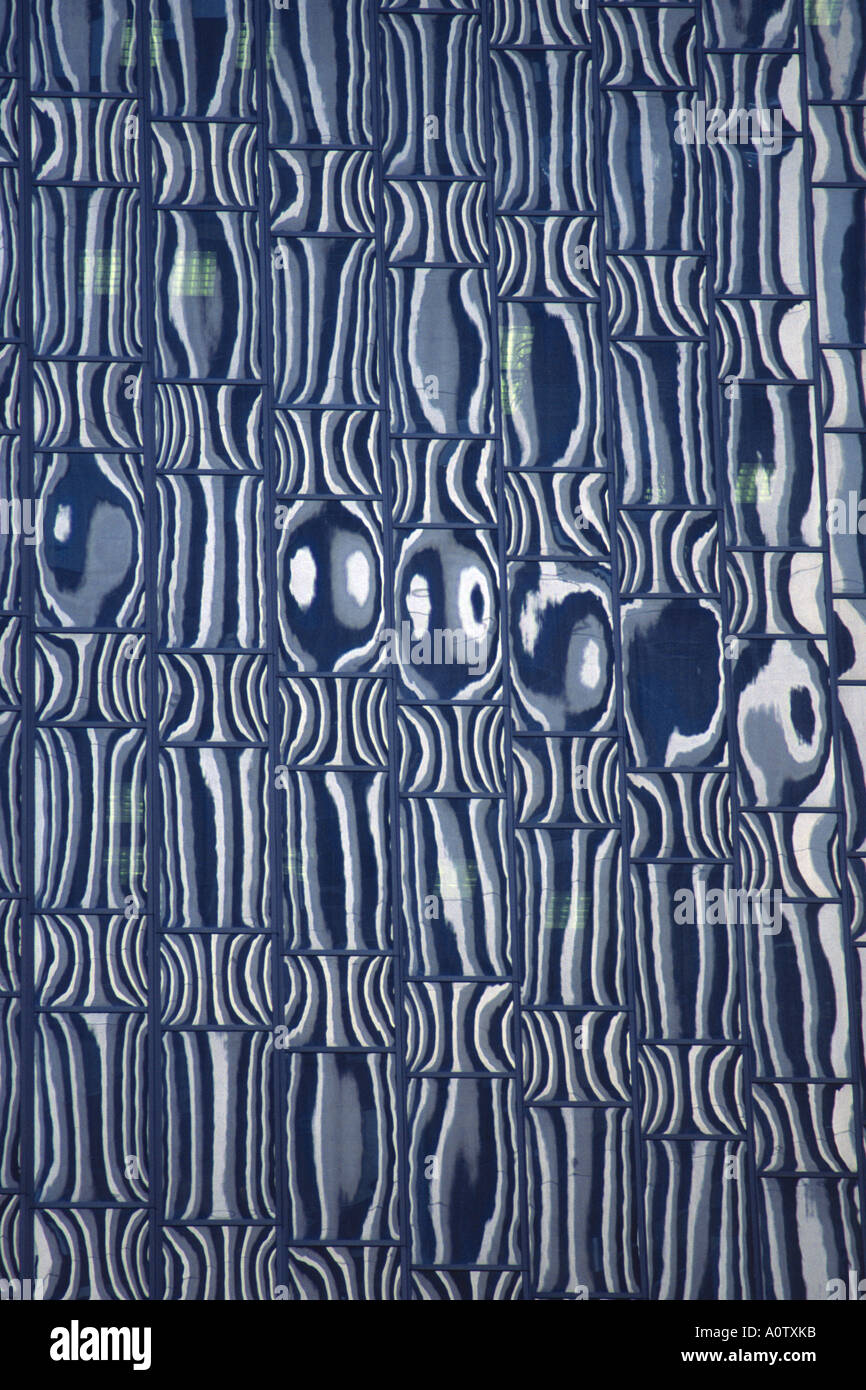 Pattern in reflection on glass windows of high rise building, San ...