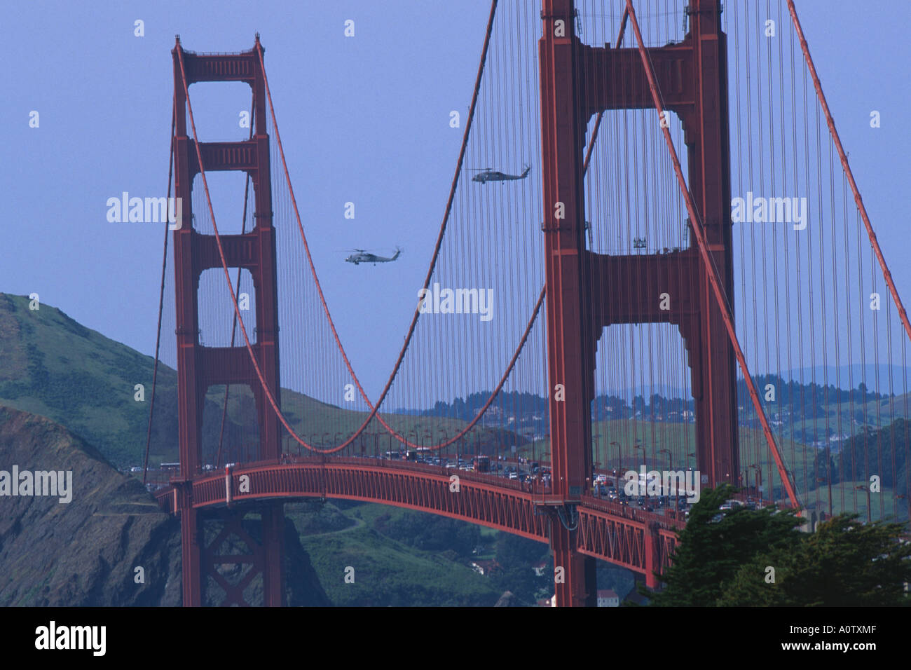 Helicopters flying over Golden Gate Bridge, San Francisco, California ...