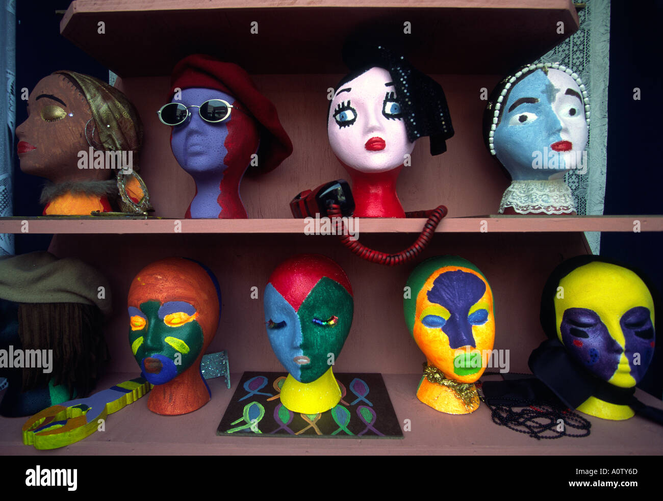 window display colorful painted mask head Stock Photo - Alamy
