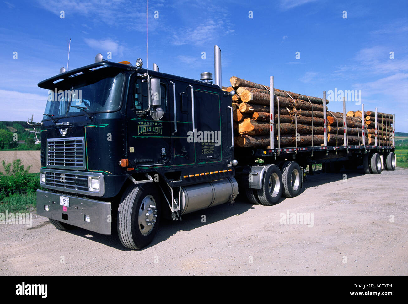 Truck hauling lumber Stock Photo - Alamy