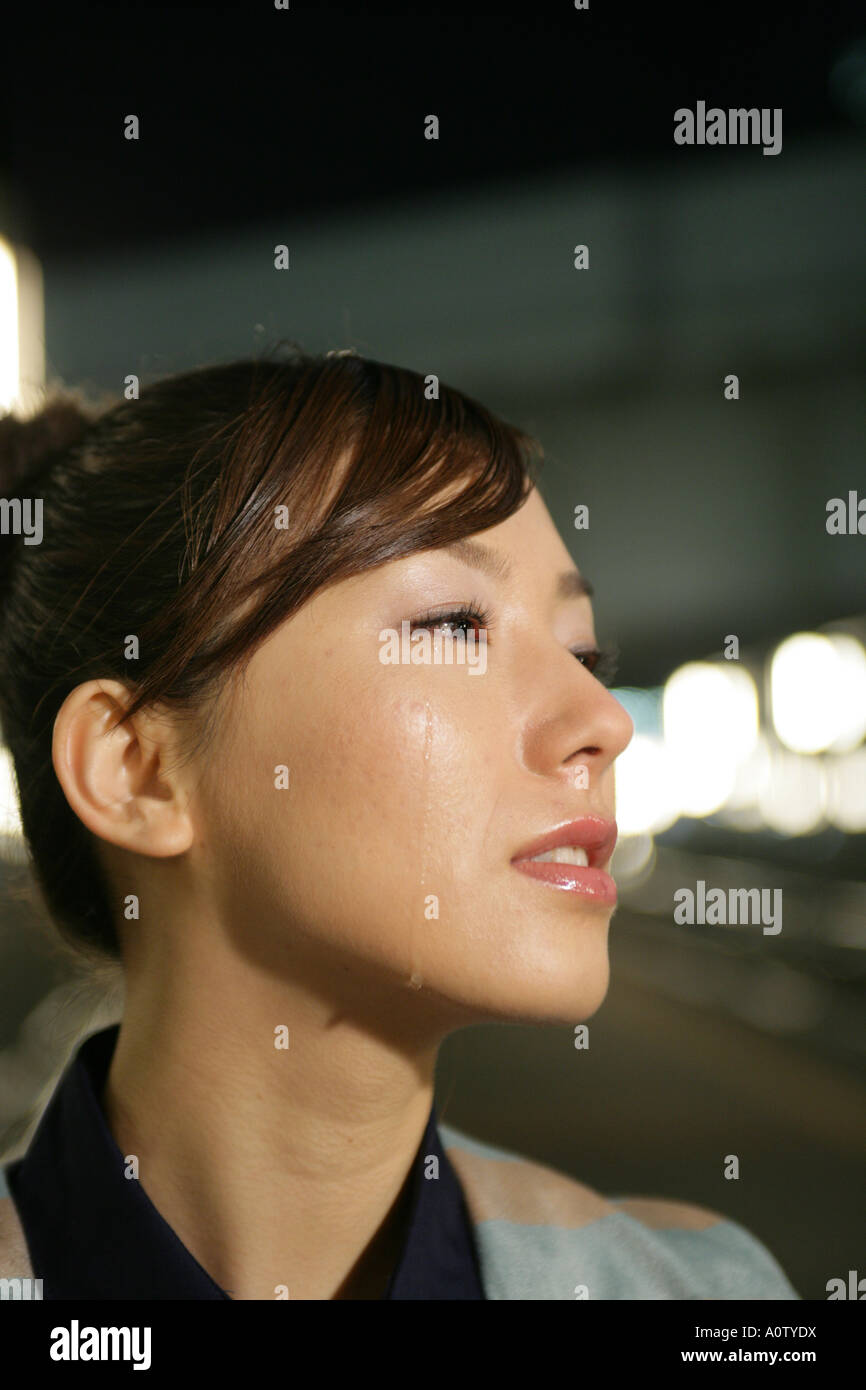 Close up of a young woman crying Stock Photo - Alamy