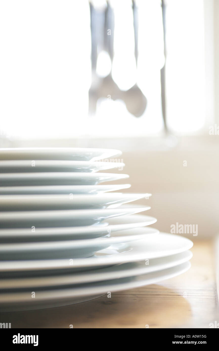 Close up of a stack of plates Stock Photo - Alamy