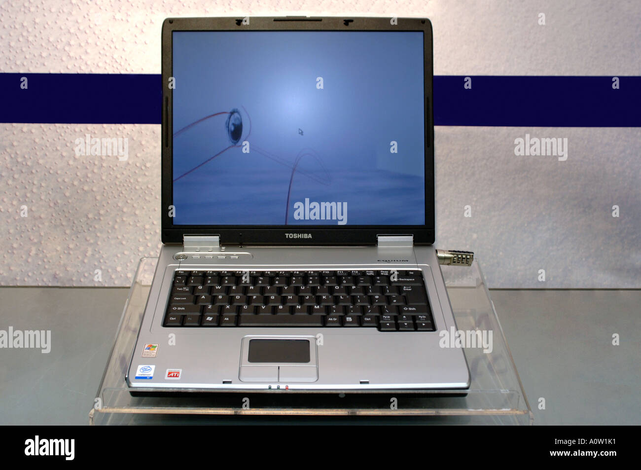 Silver colored Portable Laptop Computer showing the TFT flat screen ...