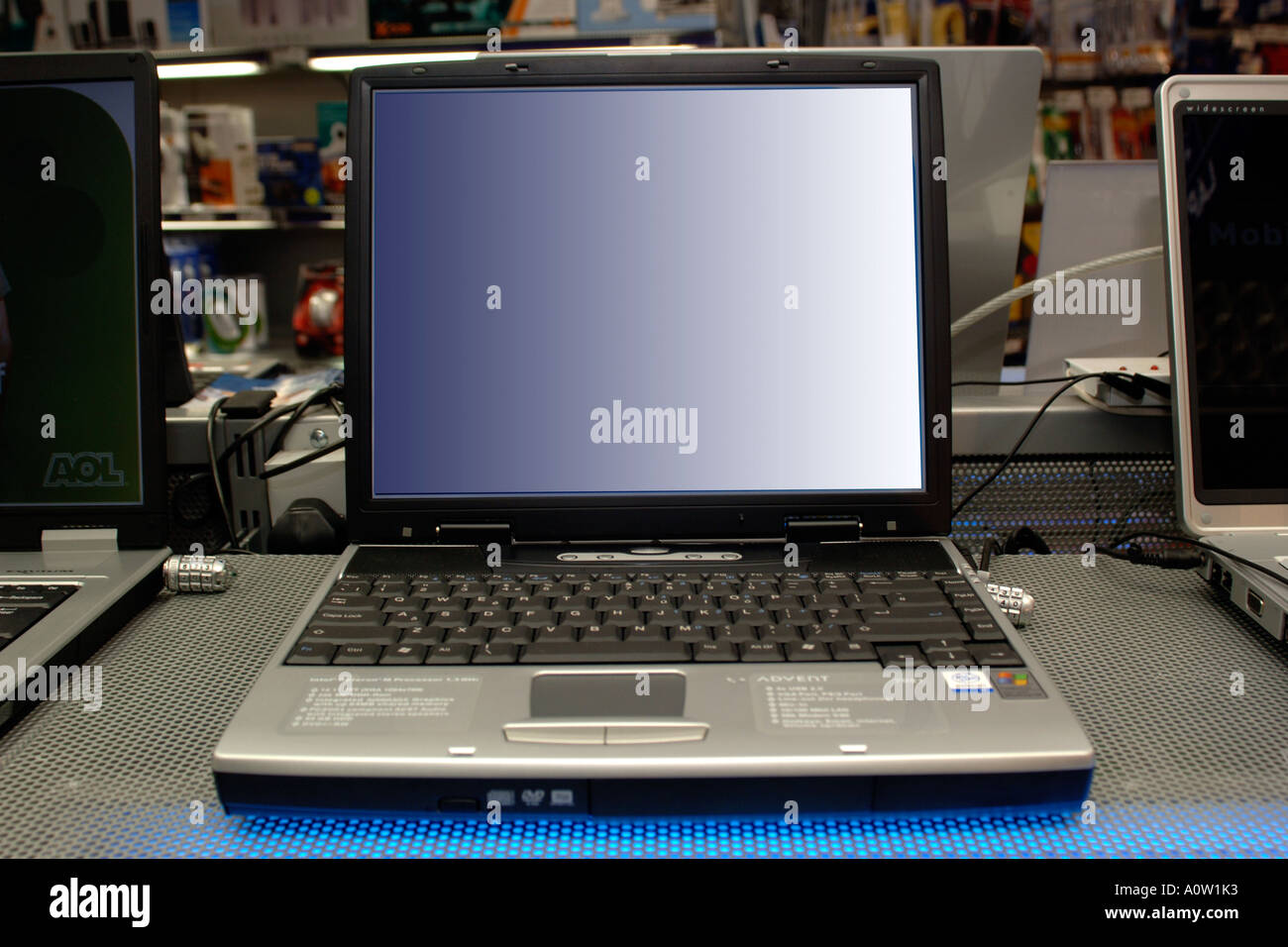 Silver colored Portable Laptop Computer showing the TFT flat screen ...