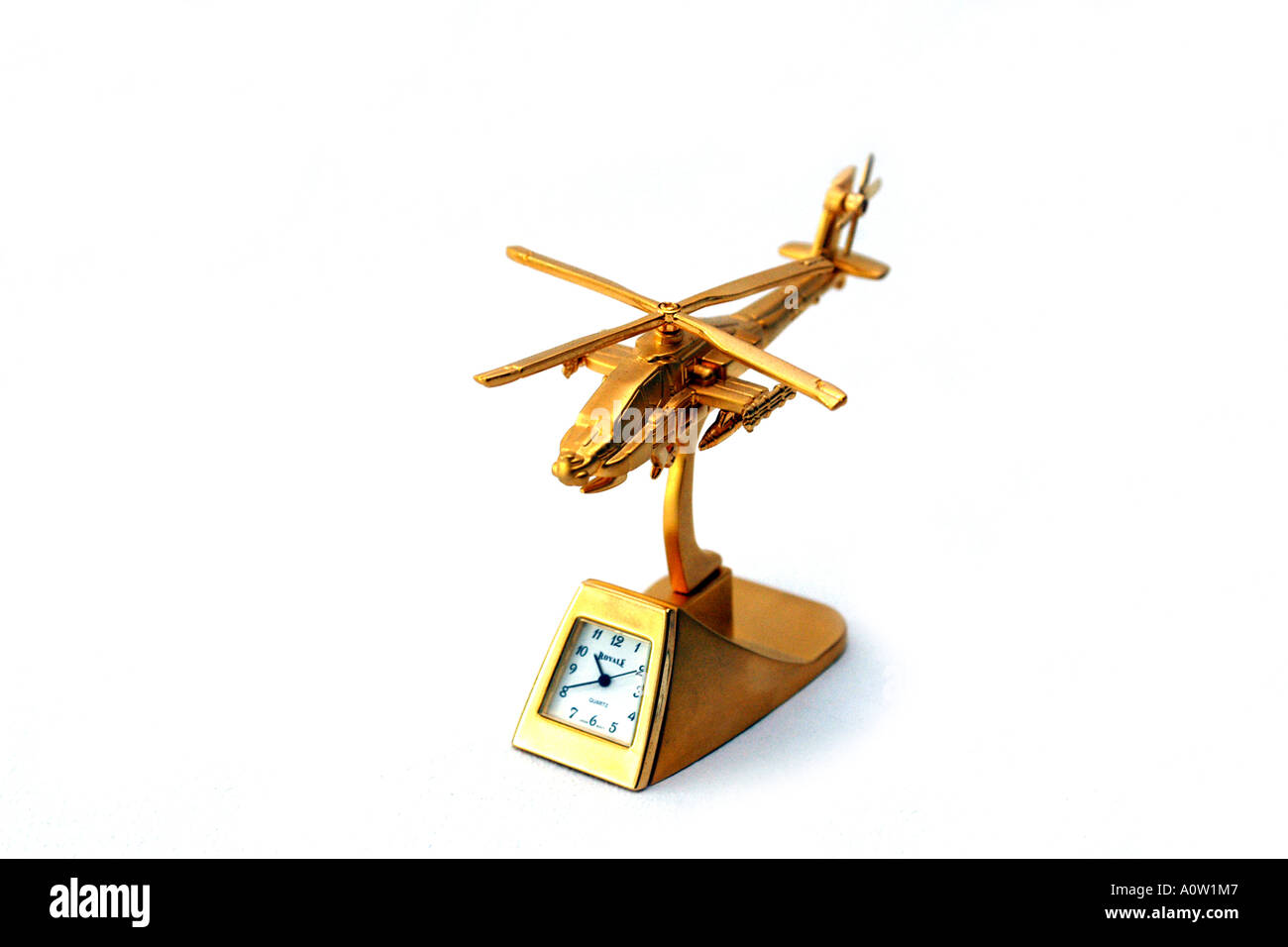 A gold plated helicopter ornamental clock Stock Photo - Alamy