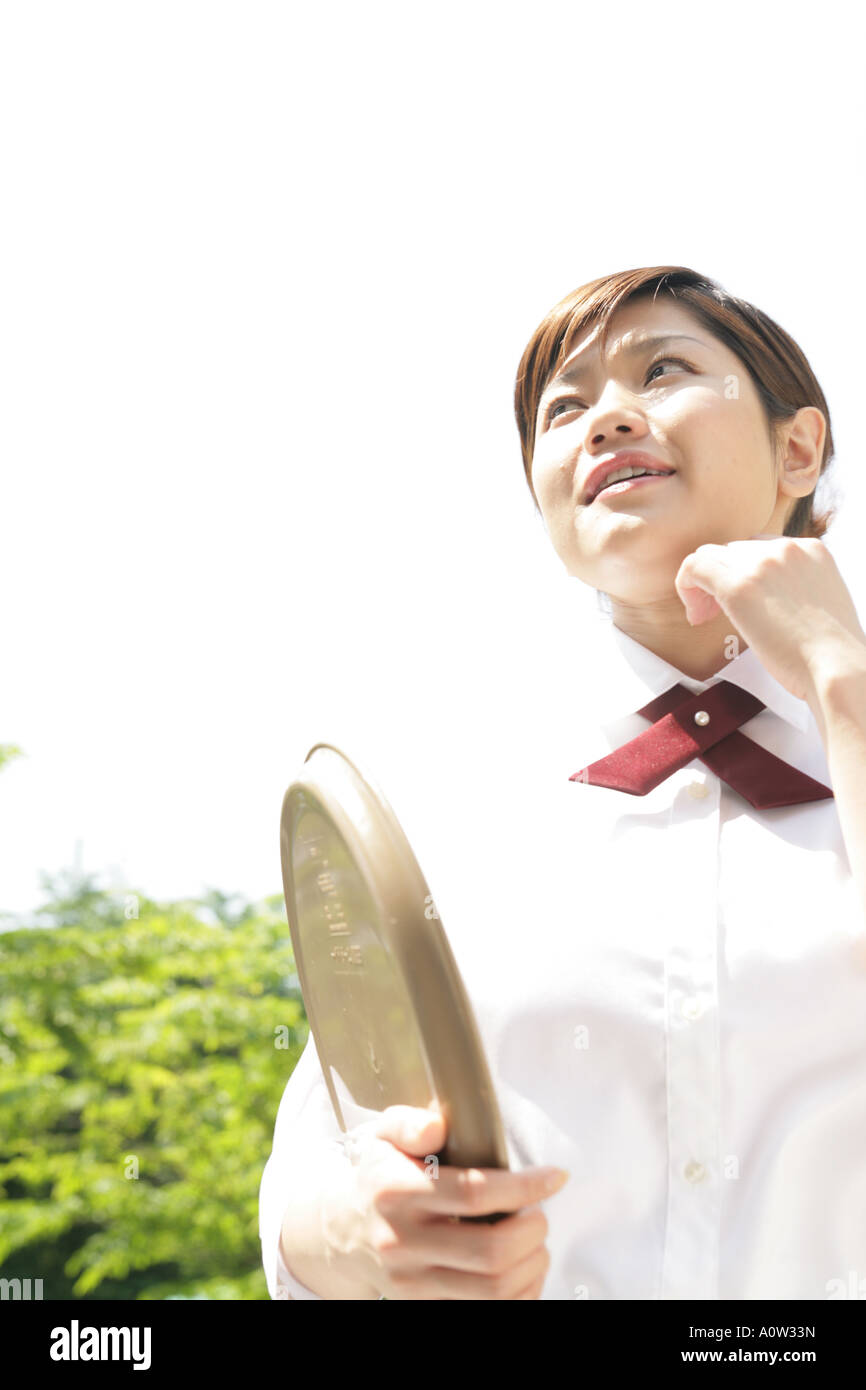 Low angle young woman standing cafe hi-res stock photography and images ...