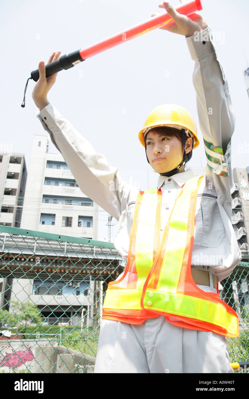Close up of a female traffic cop holding up a nightstick Stock Photo ...
