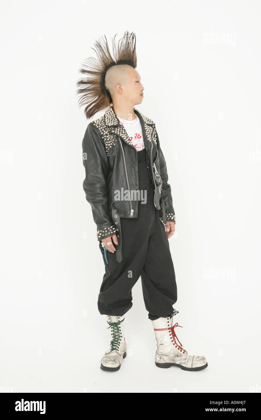 Punk young man looking away Stock Photo - Alamy