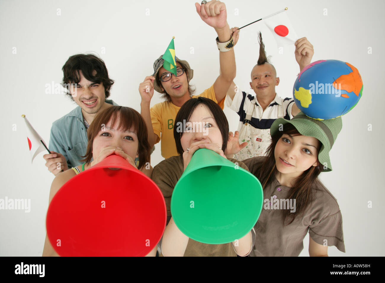 Portrait of three young couples cheering together Stock Photo - Alamy