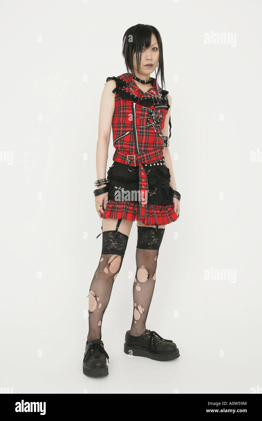 Portrait of a young woman standing Stock Photo - Alamy