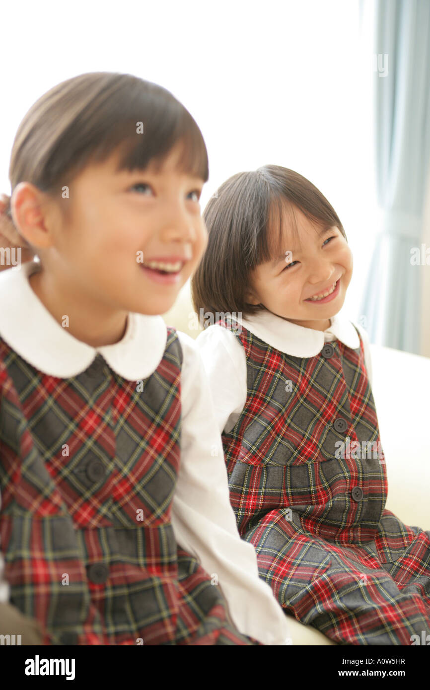 Close-up of two girls smiling Stock Photo - Alamy