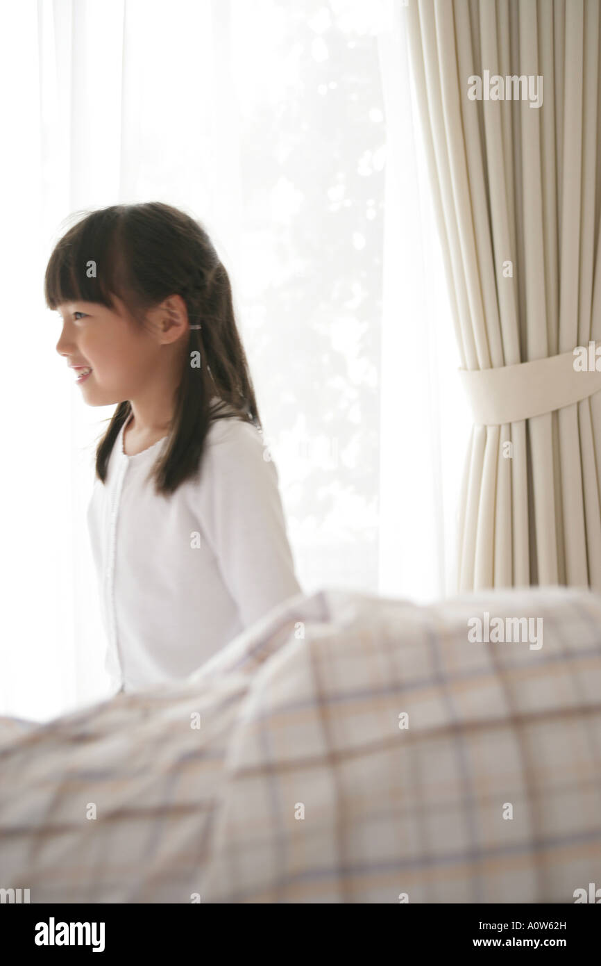 Side profile of a girl smiling Stock Photo - Alamy