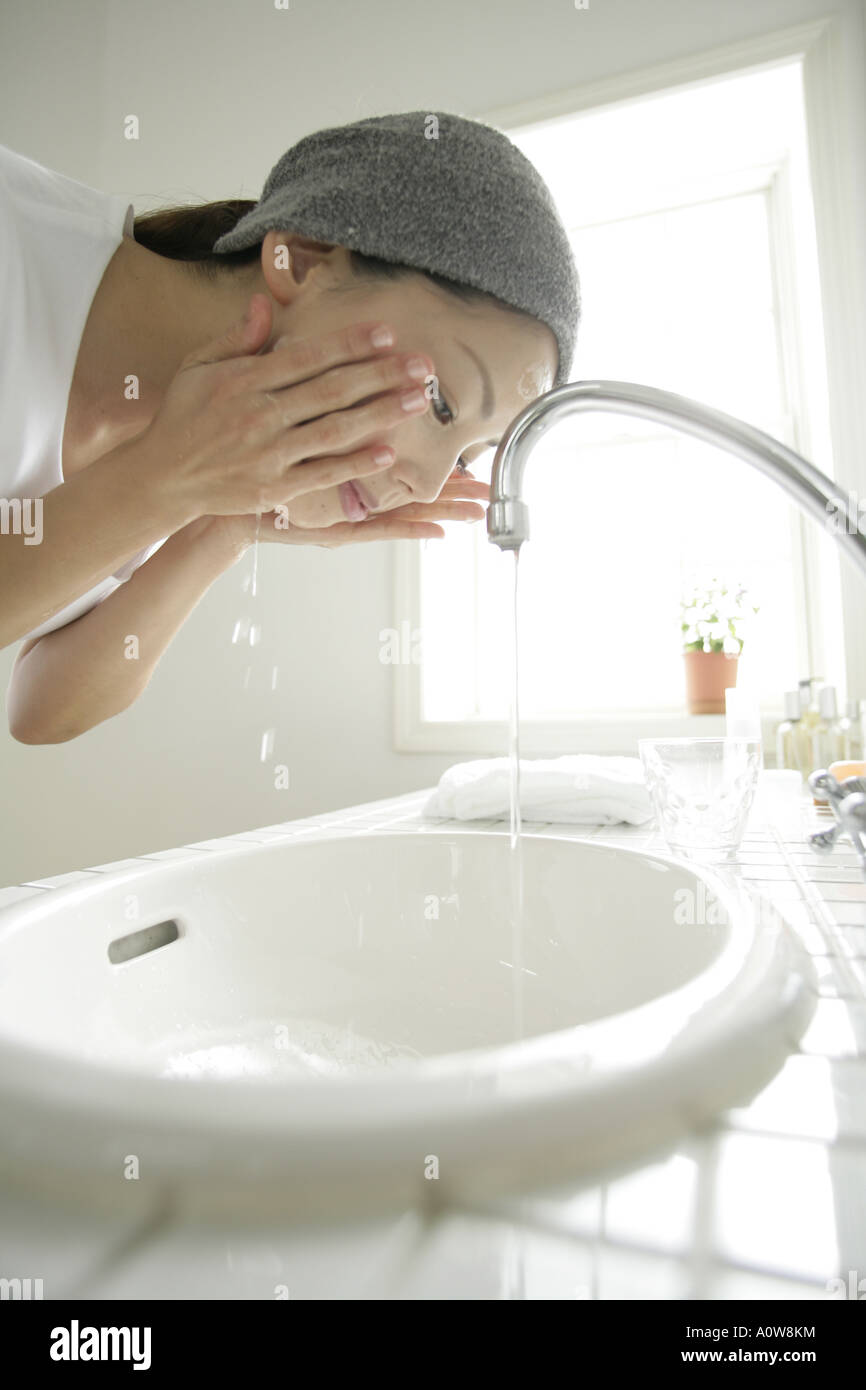 Woman bending over head down hi-res stock photography and images - Alamy