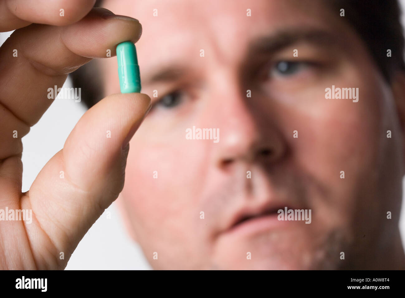 Hand male caucasian hold holding pill medicine prescription hi-res ...