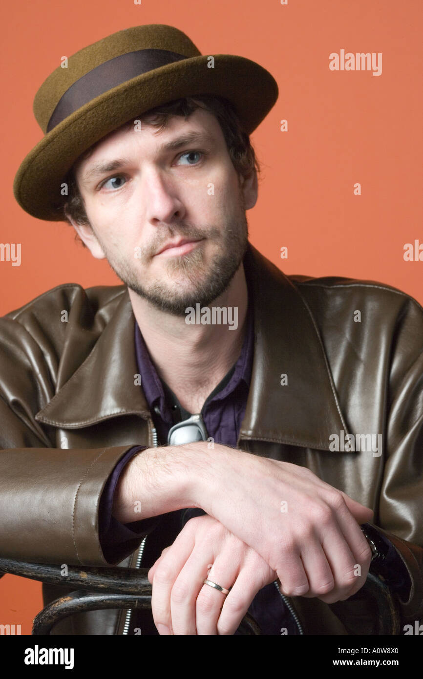 Man in leather jacket arms crossed hi-res stock photography and images - Alamy