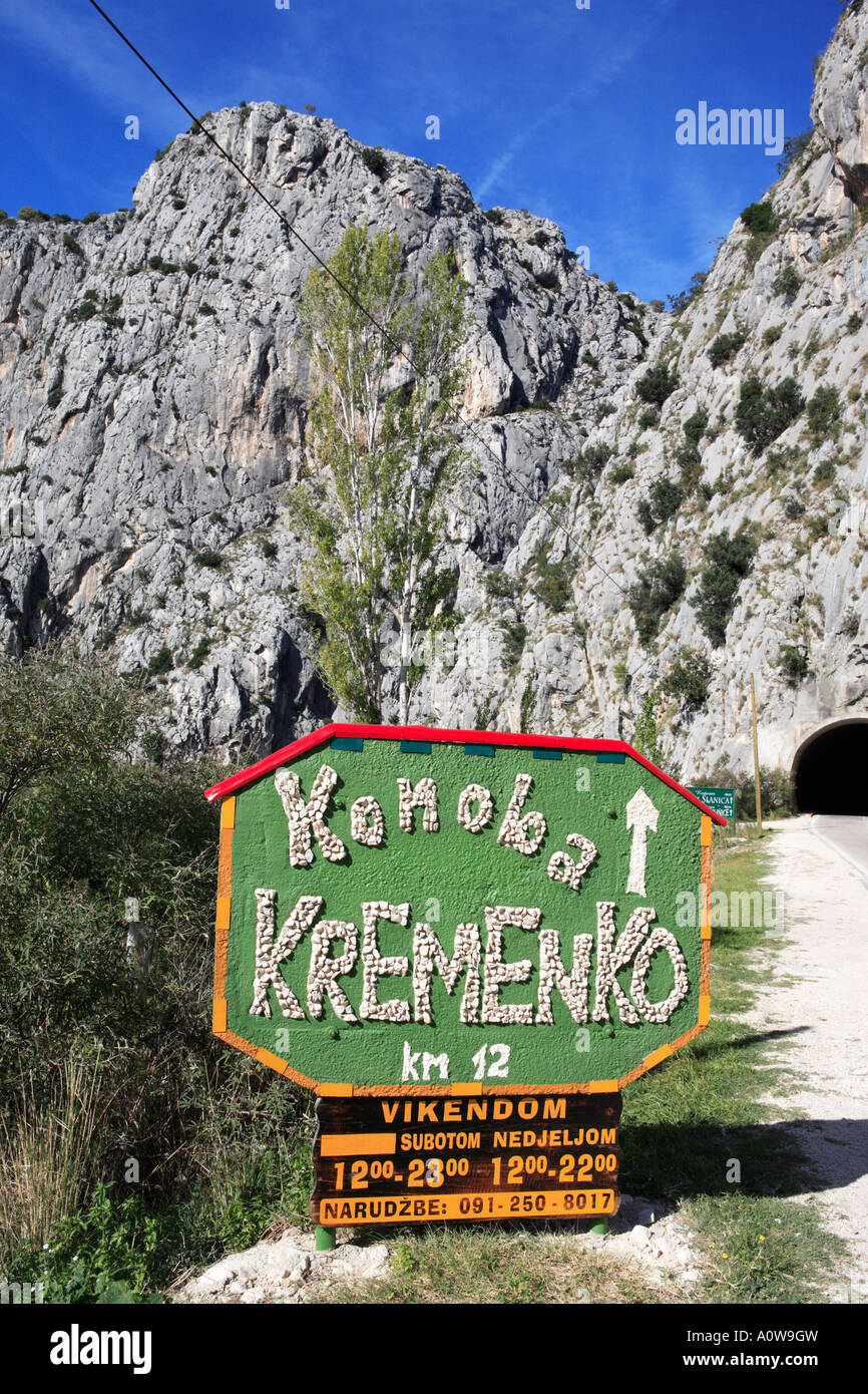 A roadside sign advertising 'Kremenko' the wine cellar known as konoba ...