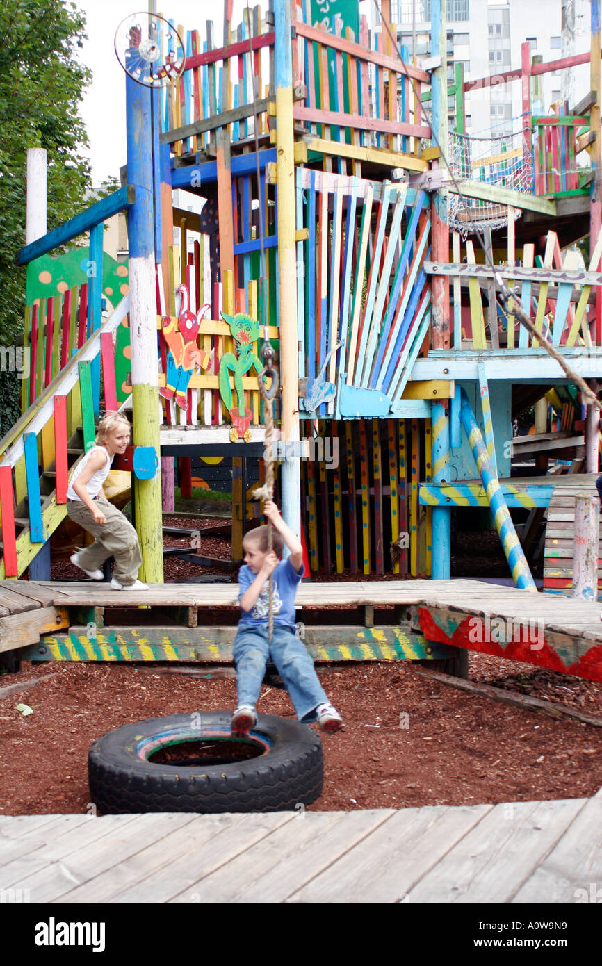 kids playing in adventure playground Stock Photo - Alamy