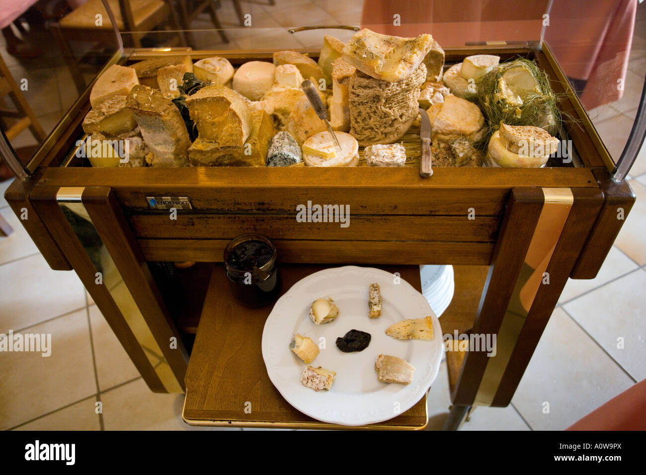 trolley with cheese board and selection of cheeses Stock Photo - Alamy