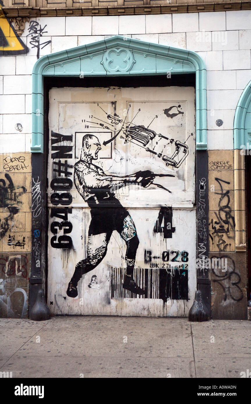 Man against machine graffiti, Manhattan, New York, Lower East Side ...