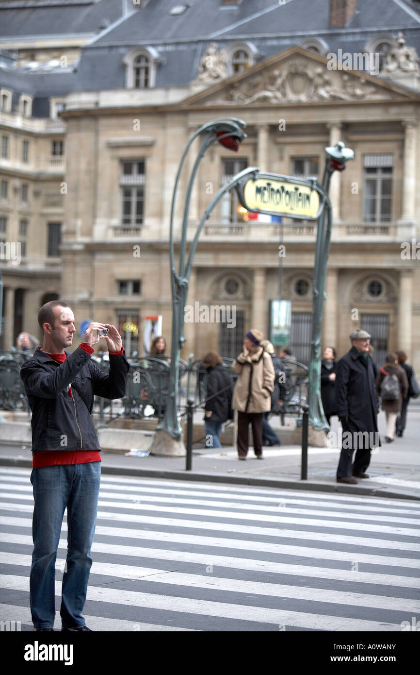 THE ENTRANCE TO THE PARIS LOUVRE METRO STATION WITH ZEBRA CROSSING ...