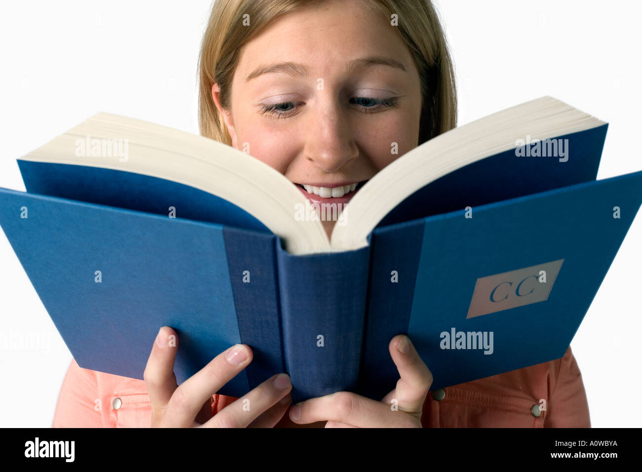 Portrait Caucasian woman reading big book Stock Photo - Alamy