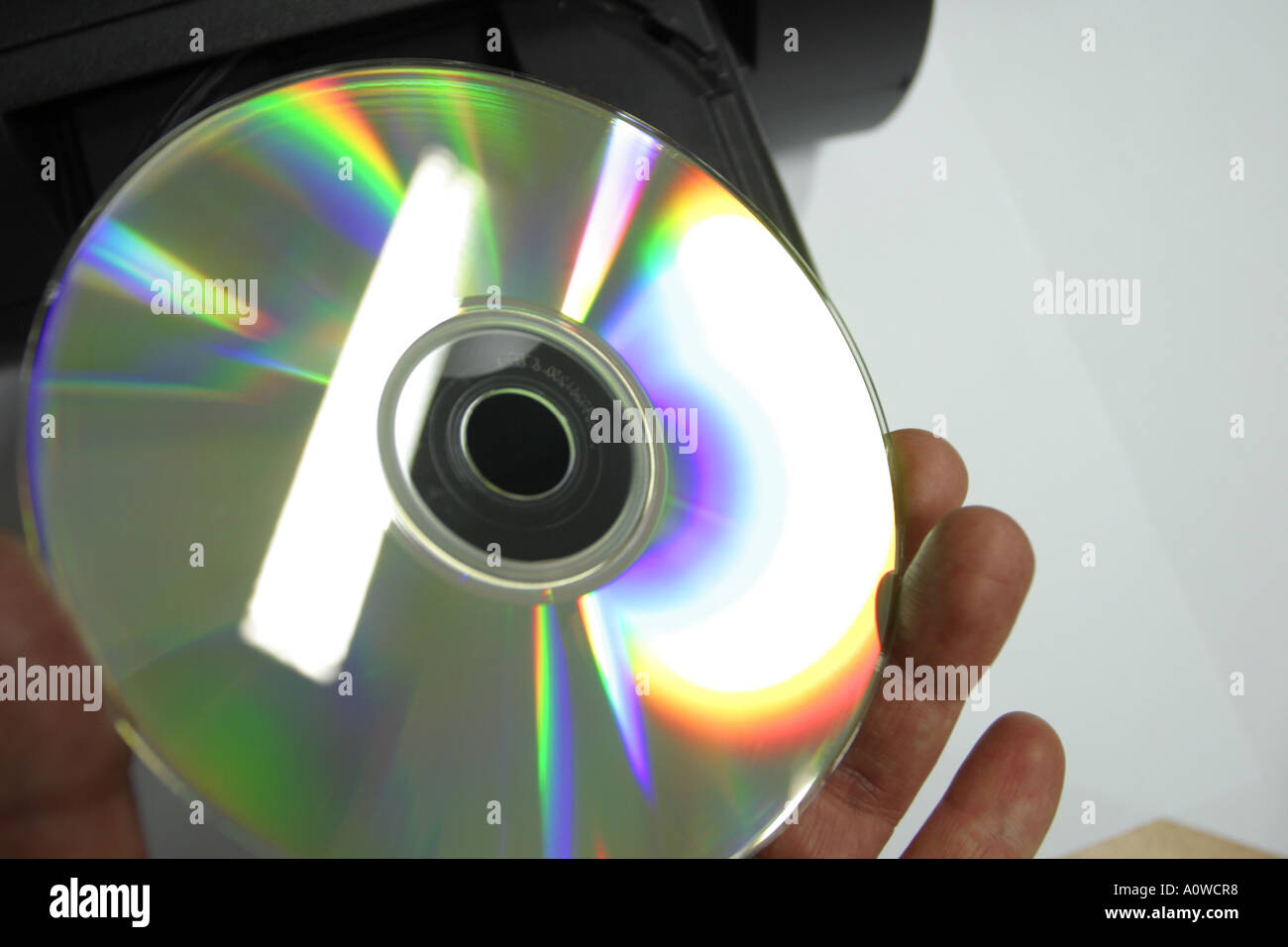 CD disc in hand Stock Photo - Alamy
