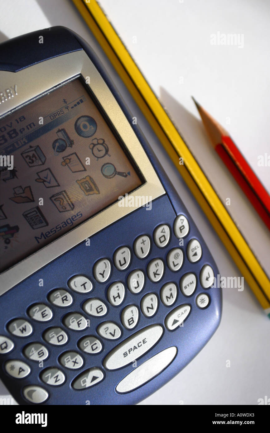 Blackberry portable handheld communication device with pencil Stock ...