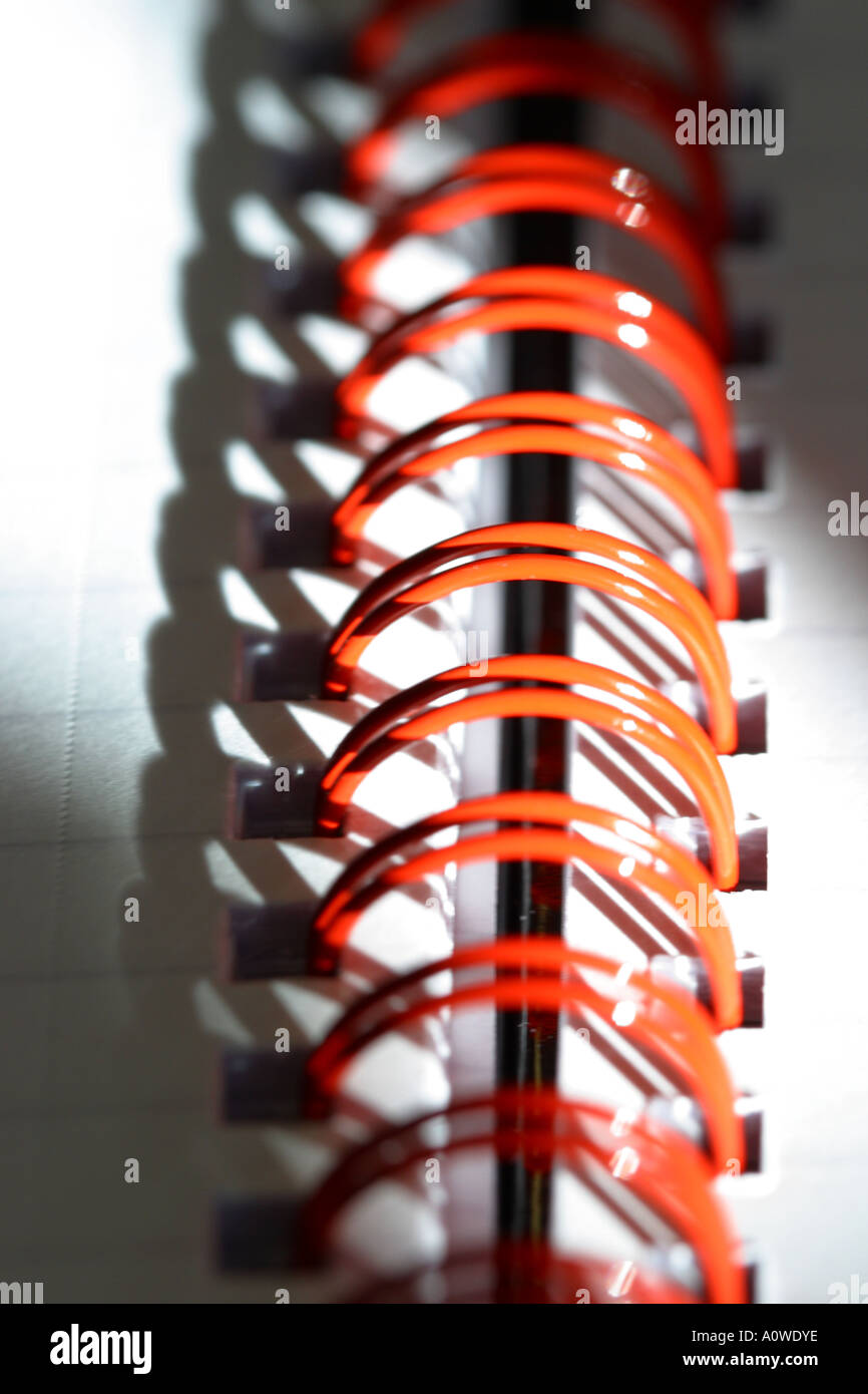 Note book with a ring spiral comb binding Stock Photo - Alamy