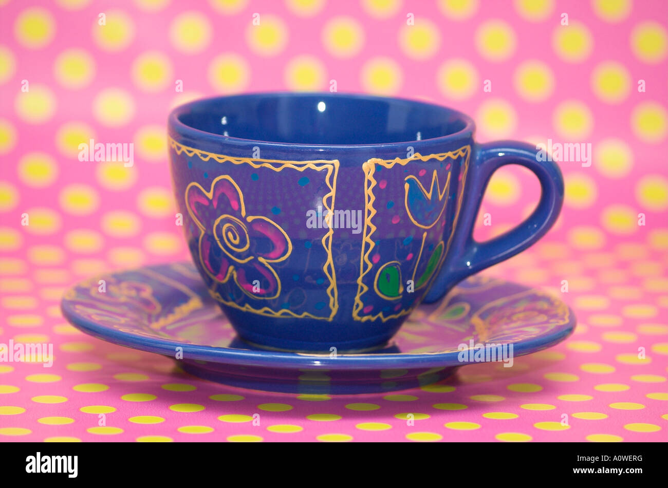 Colourful coffee cup and saucer Stock Photo - Alamy