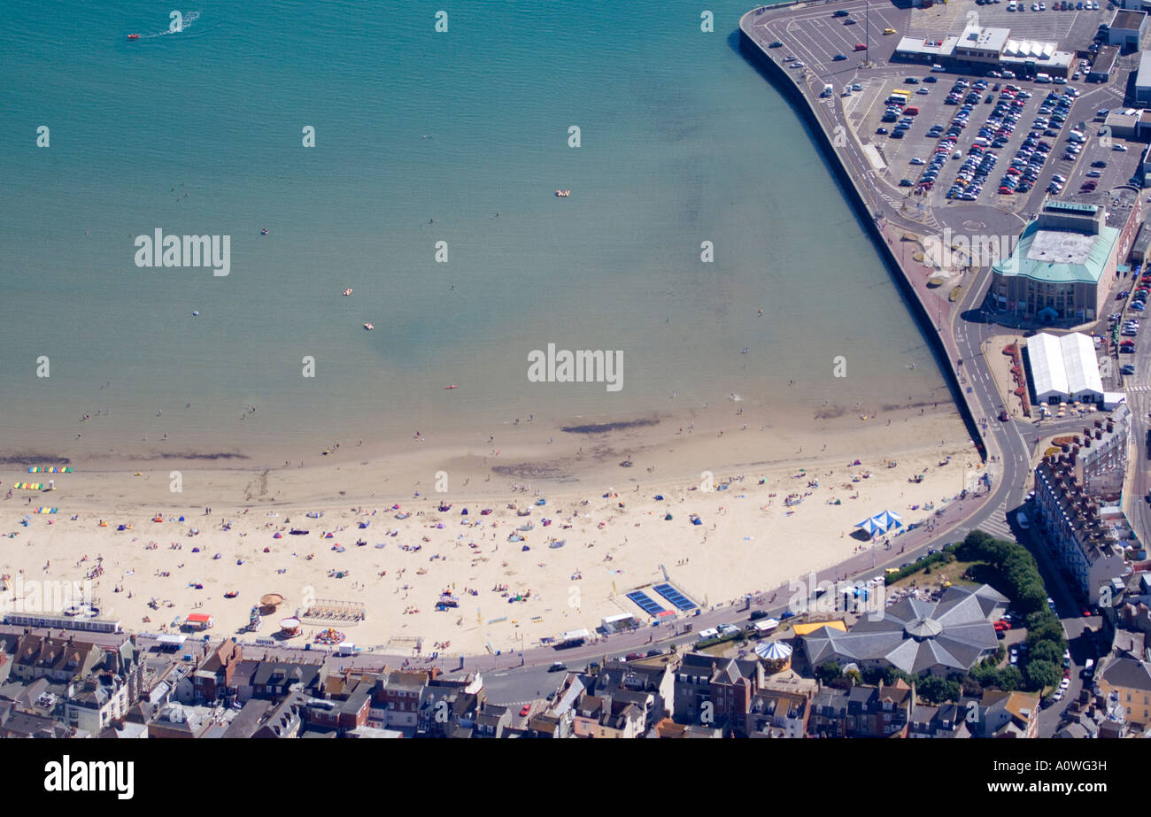 Aerial view of Weymouth beach, seafront and Pavilion Theatre. People on ...