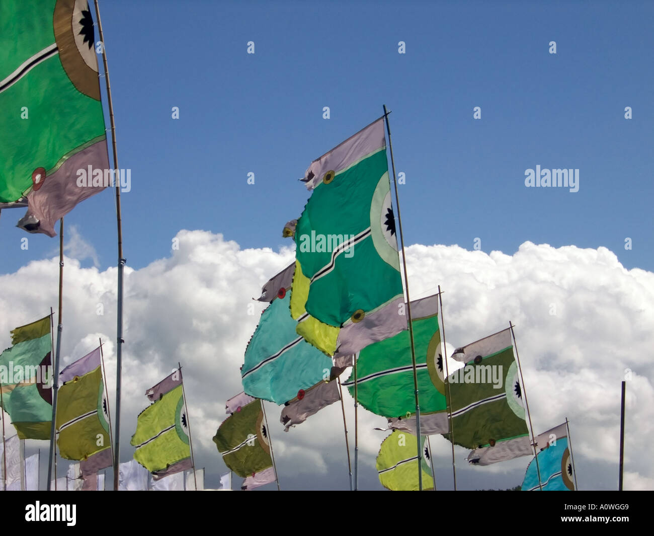 flags at festival, blowing in the wind Stock Photo - Alamy