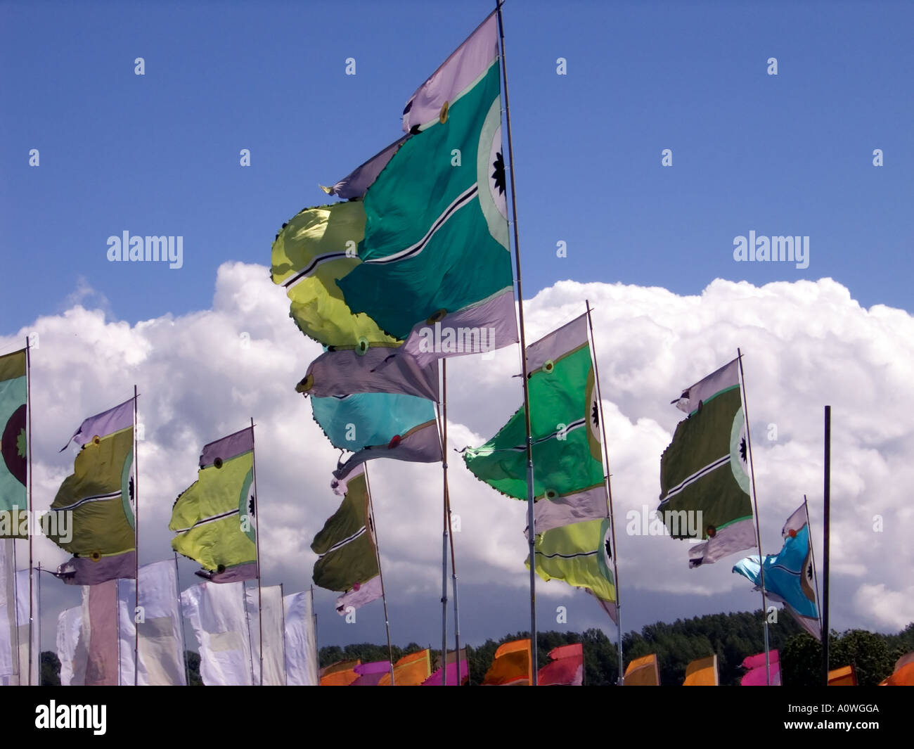 flags at festival, blowing in the wind Stock Photo - Alamy