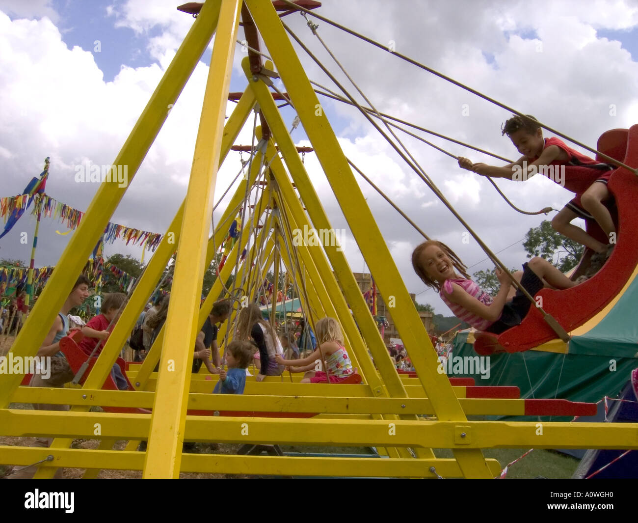 children on swingboat Stock Photo - Alamy