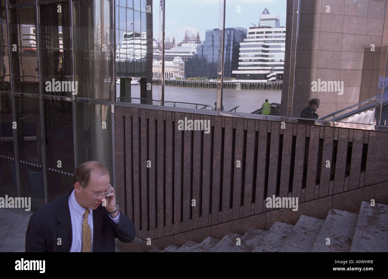 Using mobile phone london street hi-res stock photography and images ...