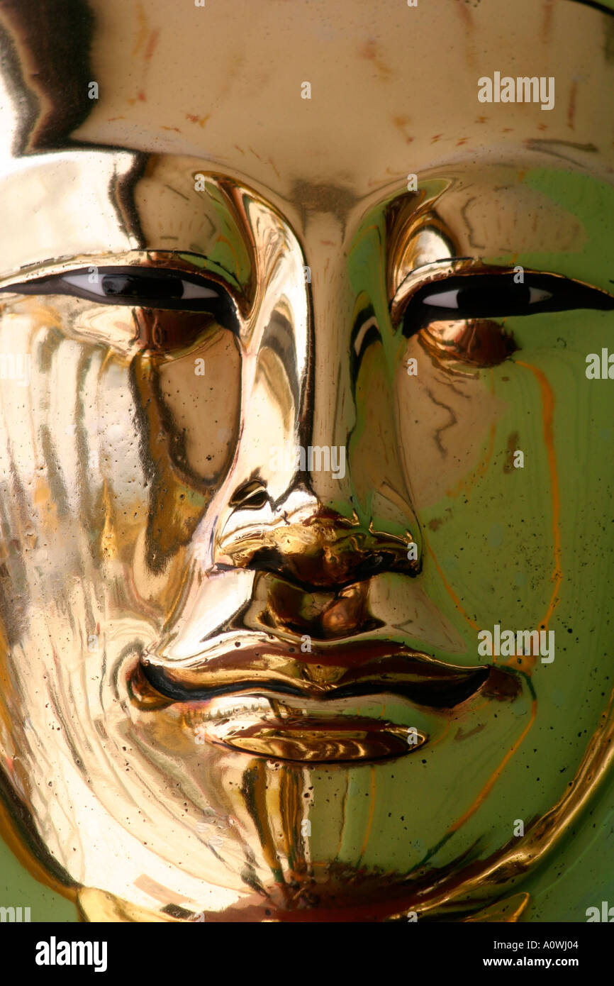a temple mask at the shwedagon in burma Stock Photo - Alamy