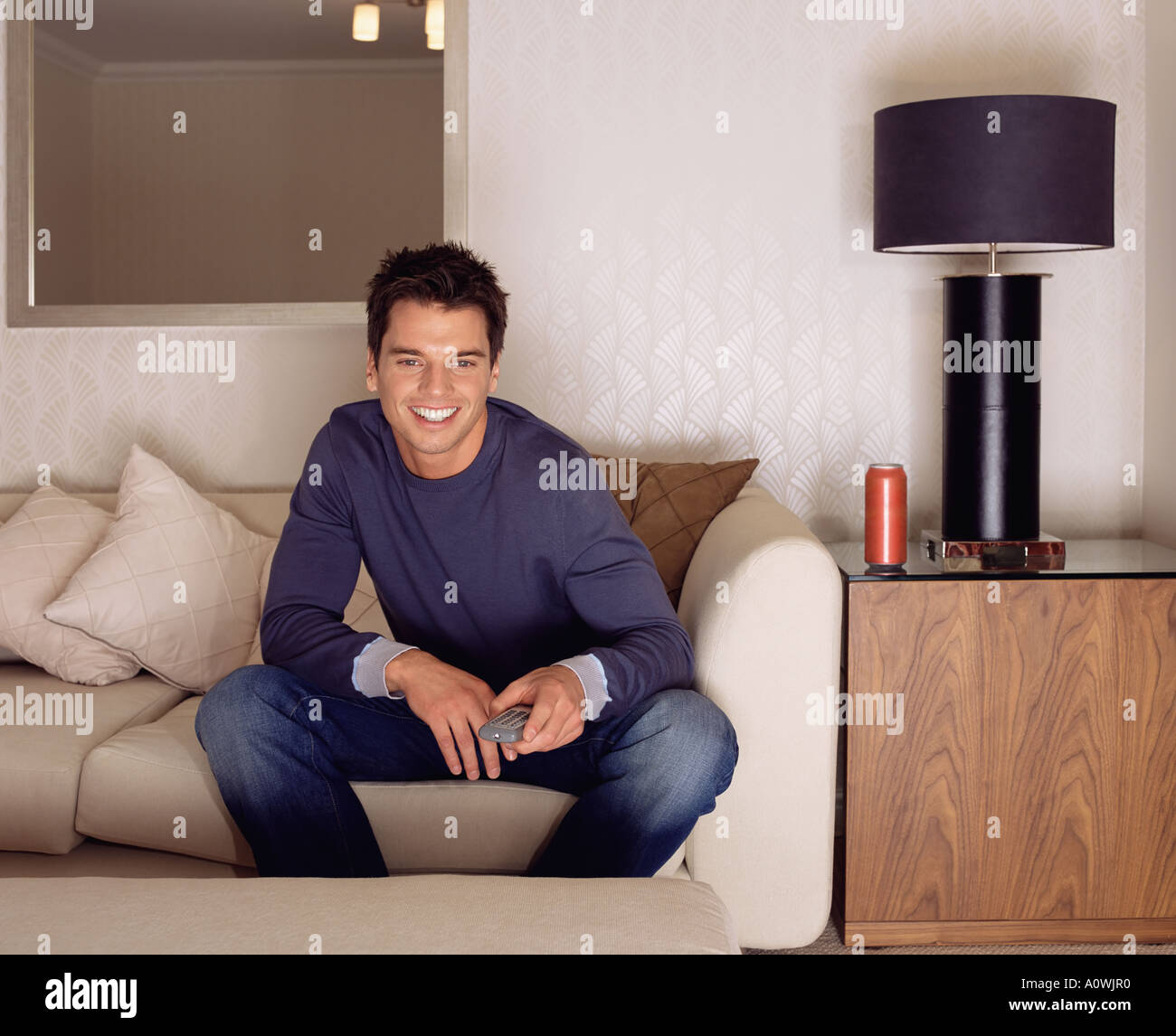 Man watching television Stock Photo - Alamy