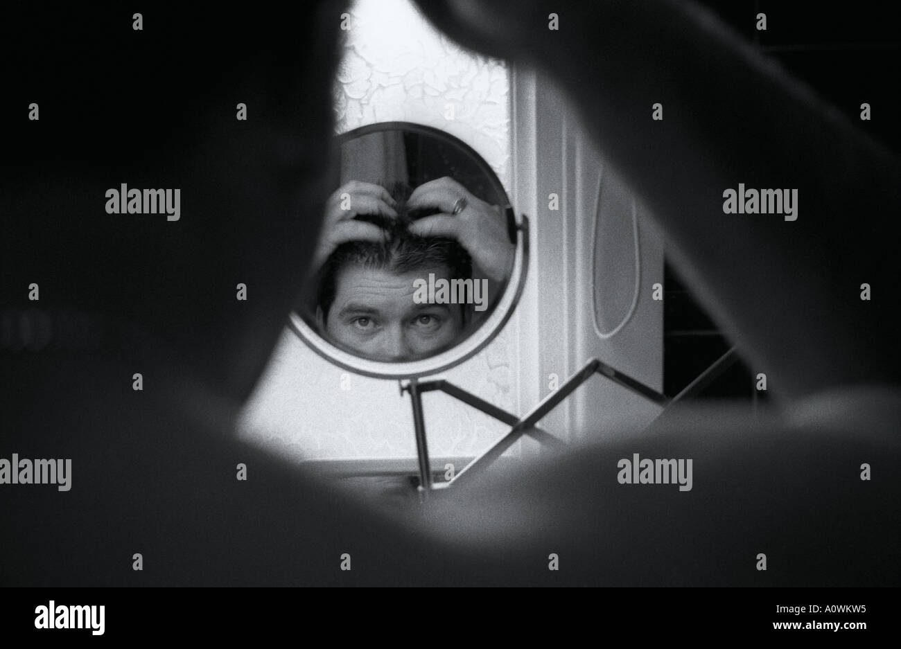 Male grooming. Reflection in bathroom mirror Stock Photo - Alamy