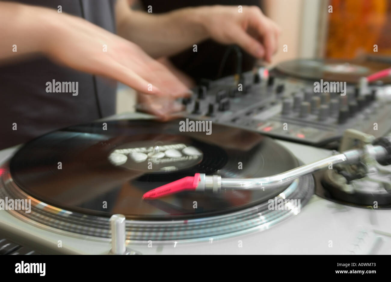 DJ at his turntables Stock Photo - Alamy