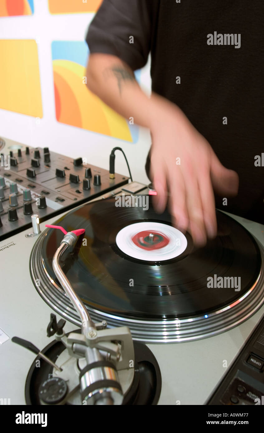 DJ at his turntables Stock Photo - Alamy