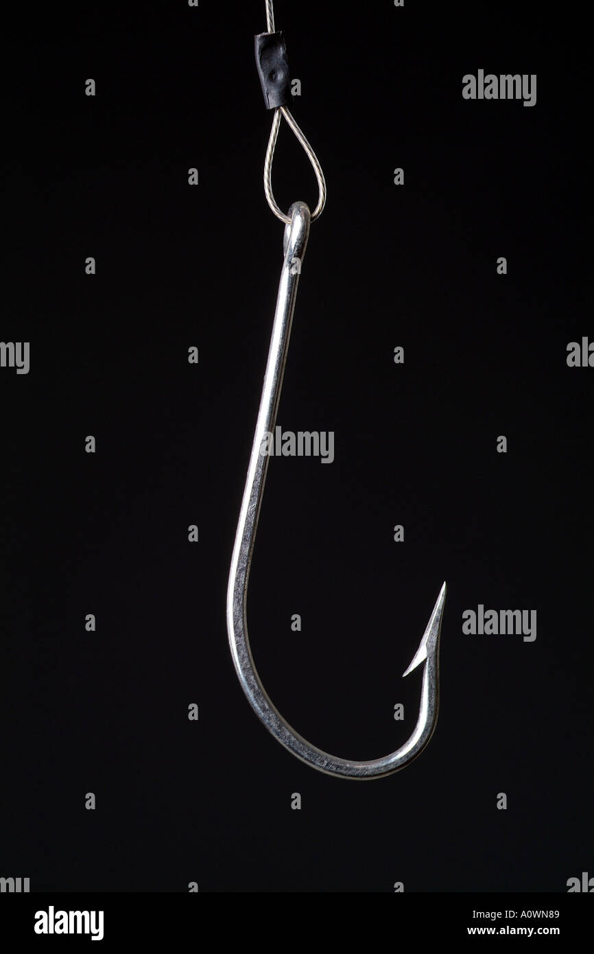 A Fishing Hook on a line with a black background Industrial large Shark ...