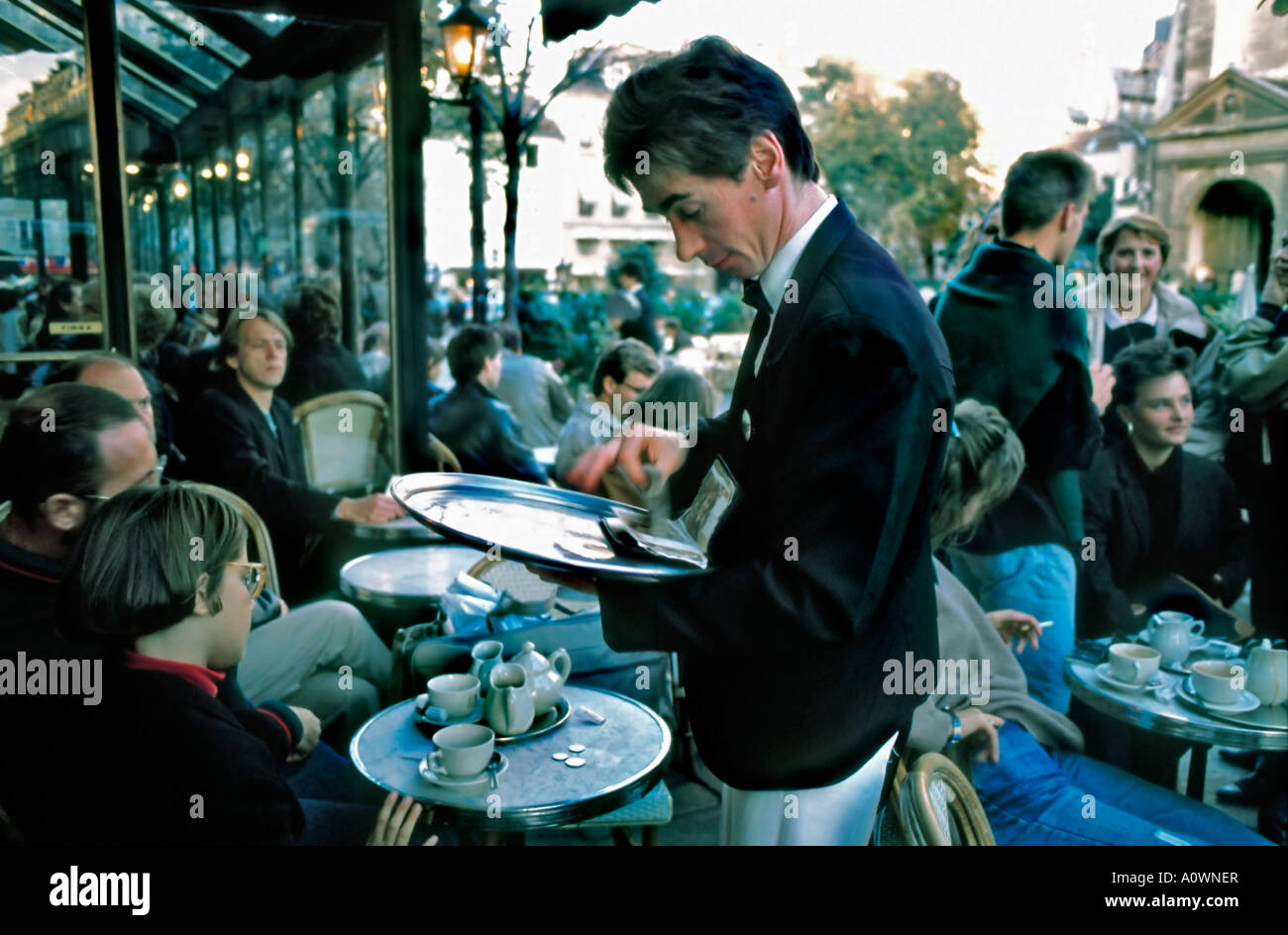 Paris France, Crowd of People Sharing Drinks at French Café Terrace ...