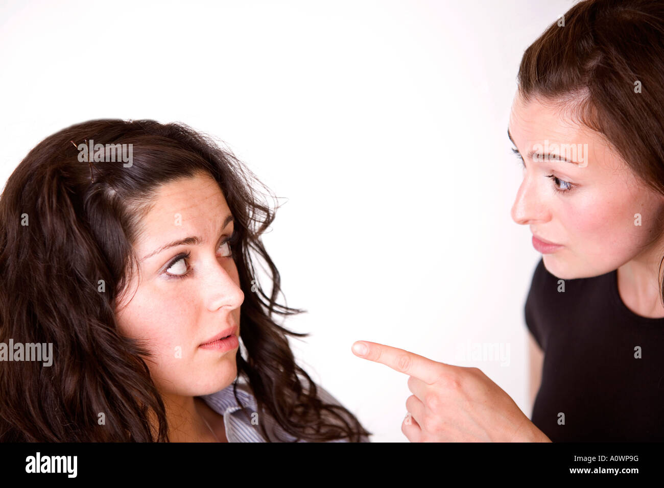 Two women having an argument Stock Photo - Alamy