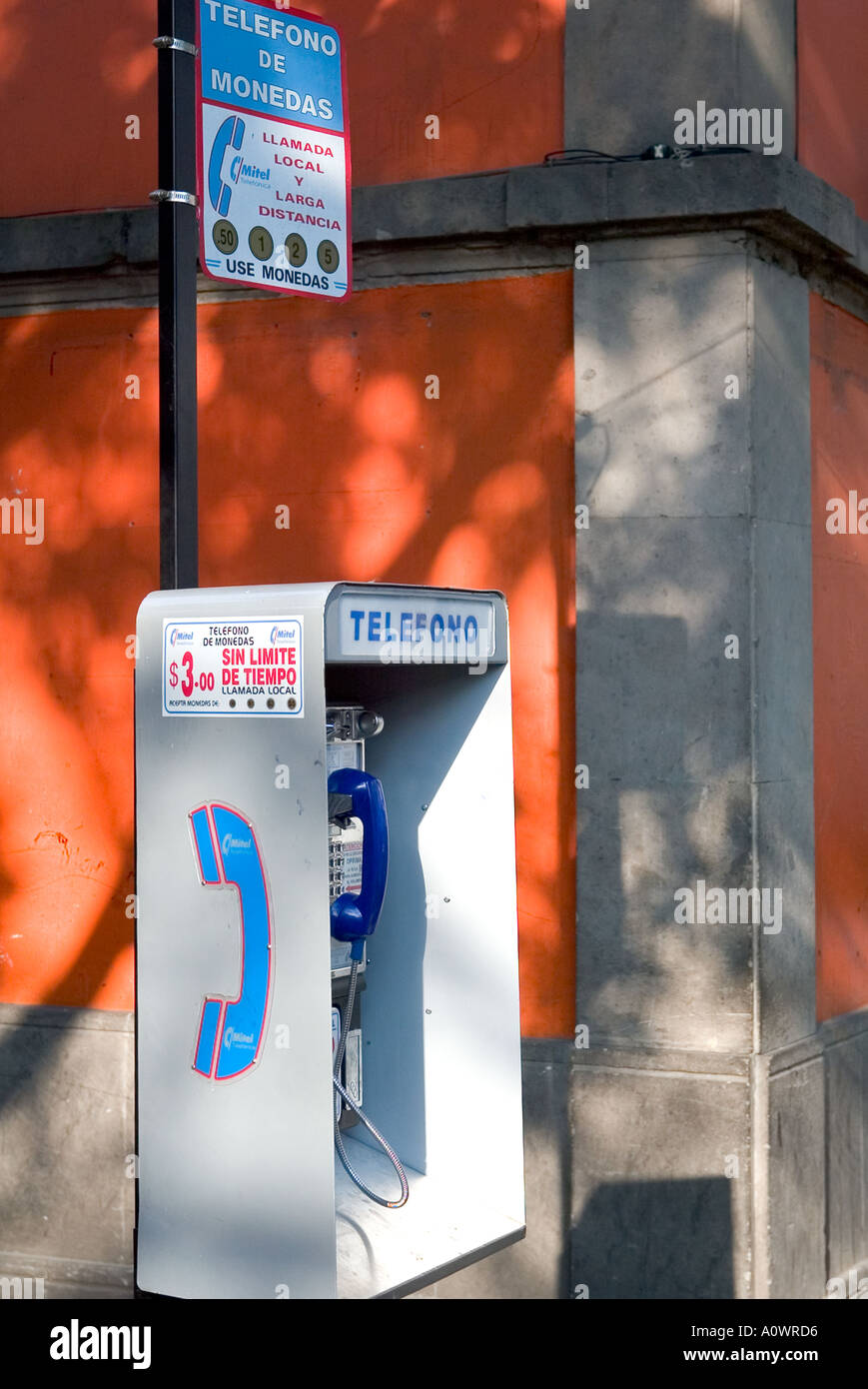 Public telephone on a street in Mexico City Stock Photo - Alamy