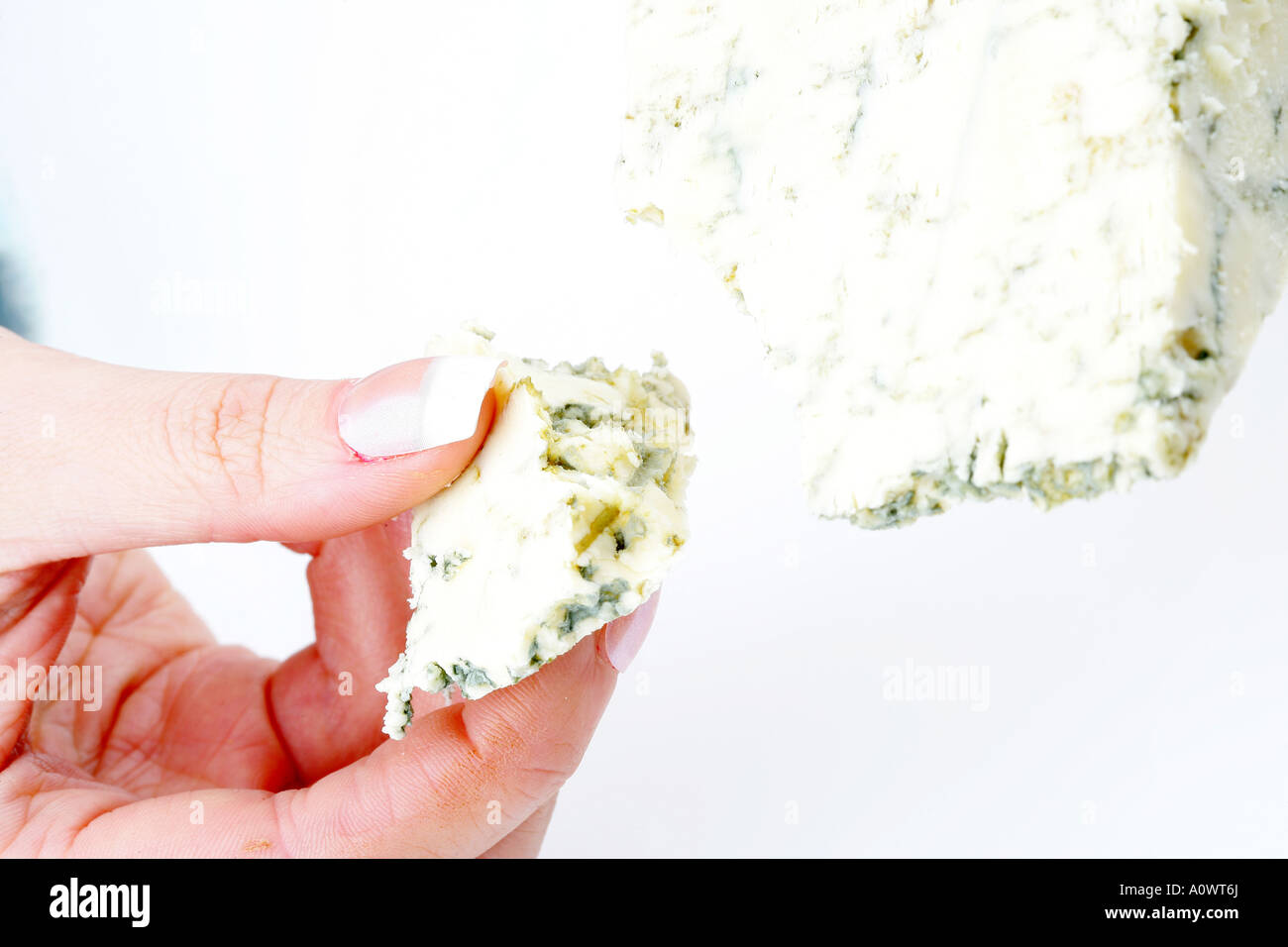 Breaking off cheese hi-res stock photography and images - Alamy
