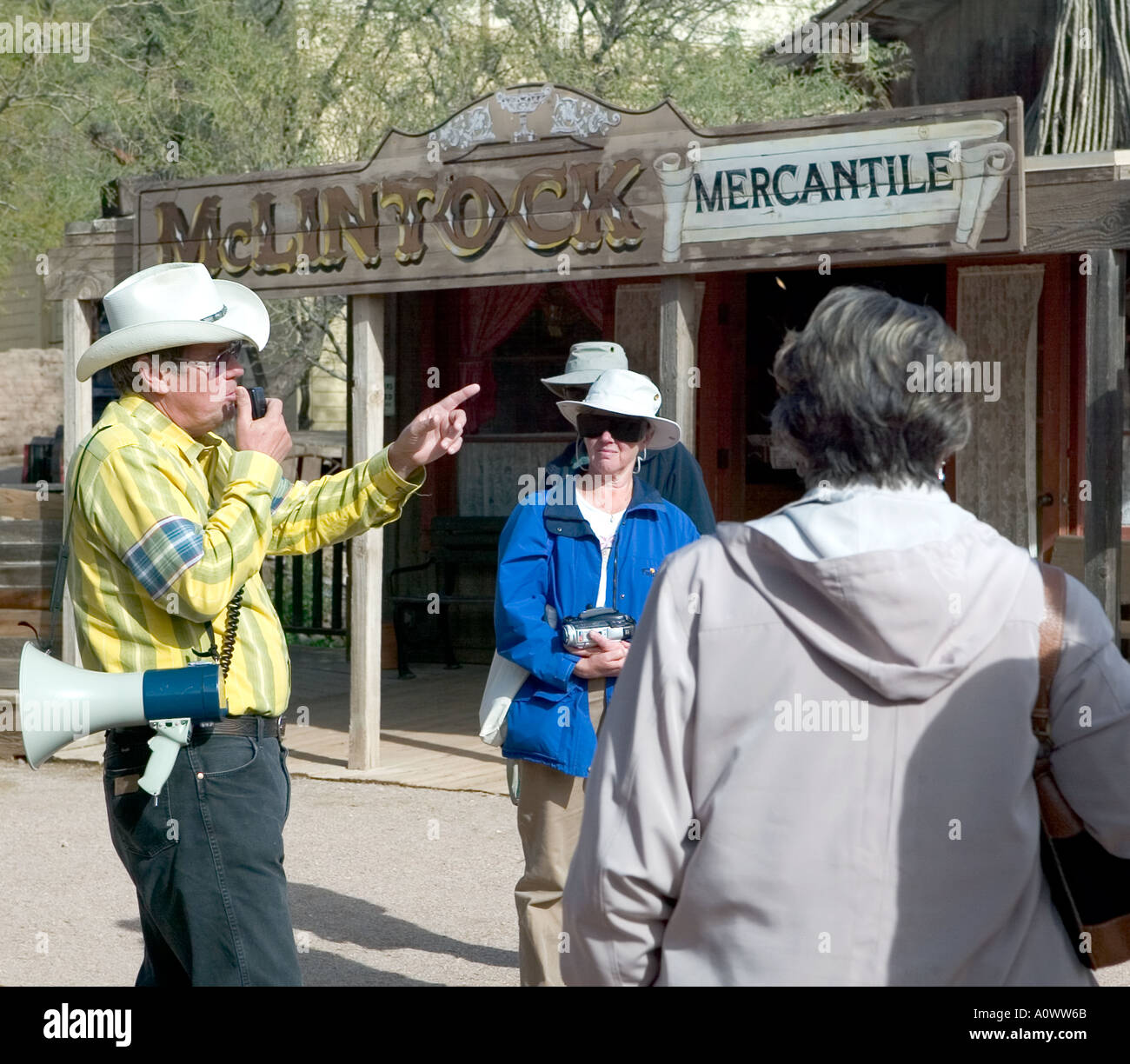 Tour group and guide with loud hailer at Tucson Studios Arizona USA ...