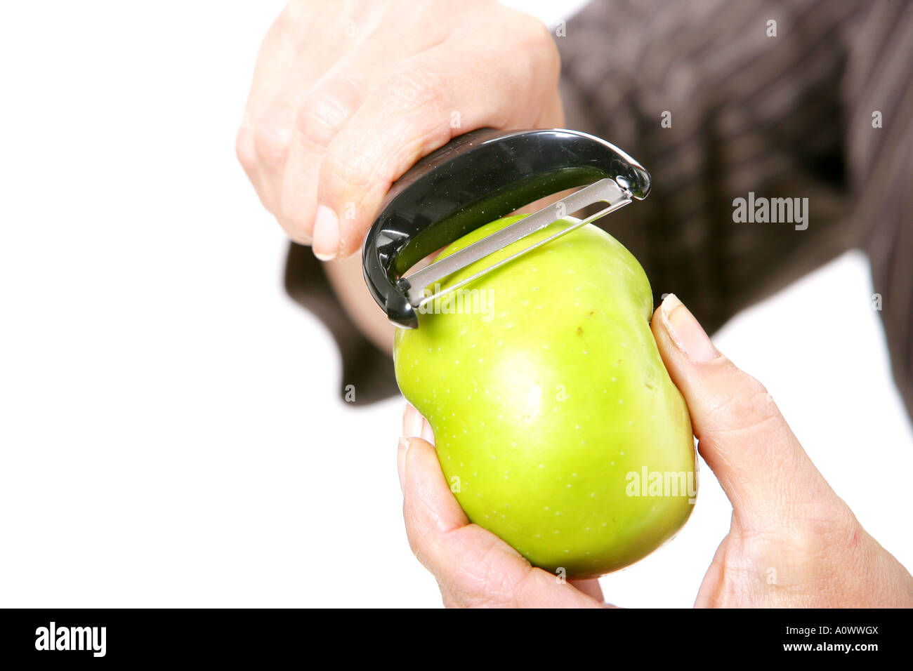 Woman Peeling an Apple Model Released Stock Photo - Alamy