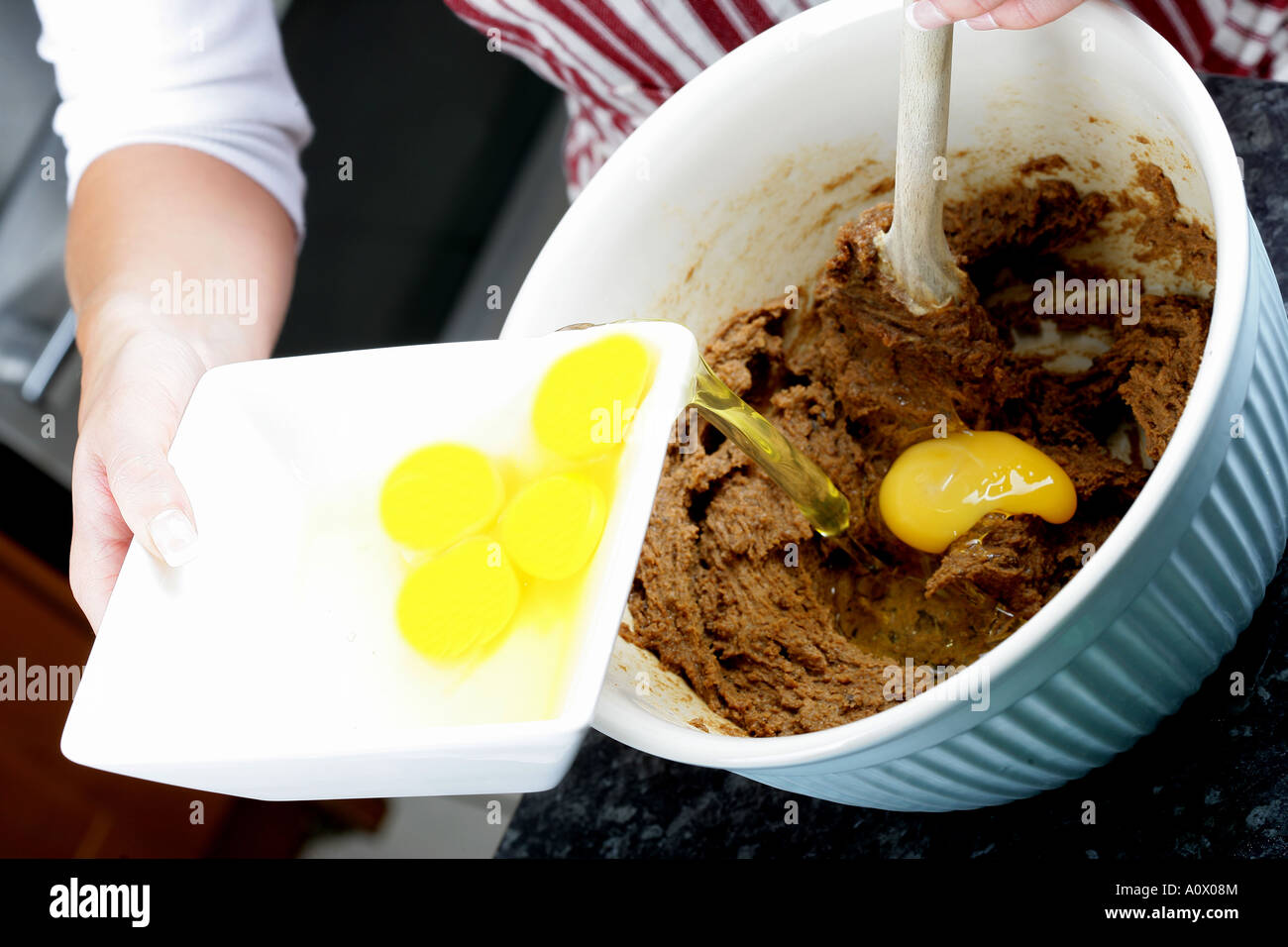 Young Woman Making a Cake Model Released Stock Photo - Alamy
