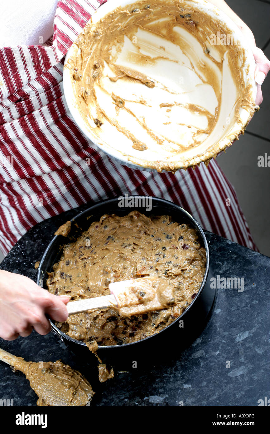 Young Woman Making a Cake Model Released Stock Photo - Alamy
